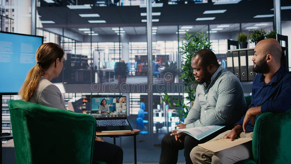 Professional Team Using Video Call Technology To Support Company ...