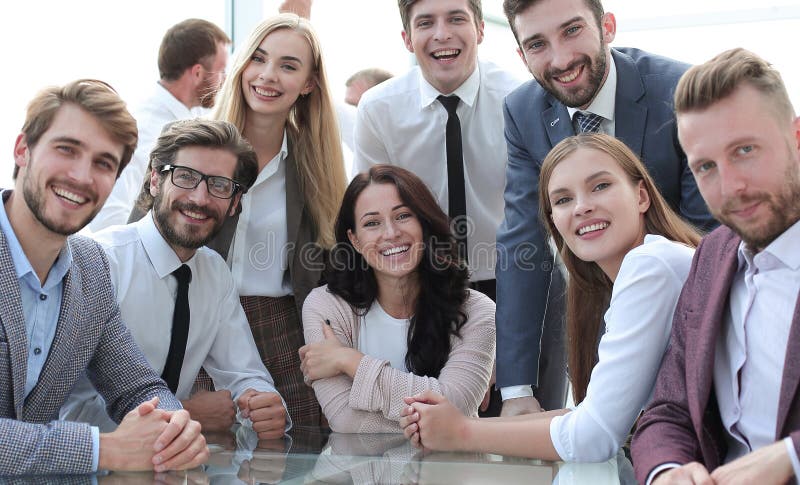 Professional Team of Young Business People Sitting at the Table. Stock ...