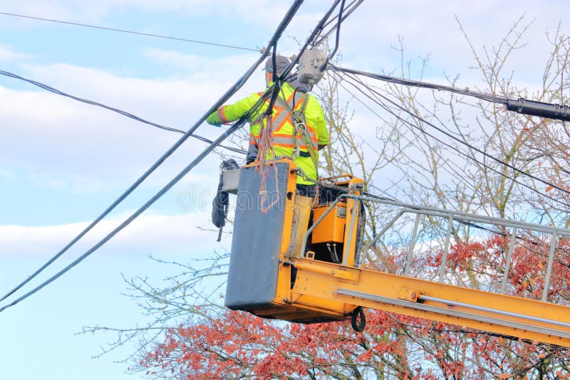Professional Technician in Bucket or Lift Stock Photo - Image of close ...