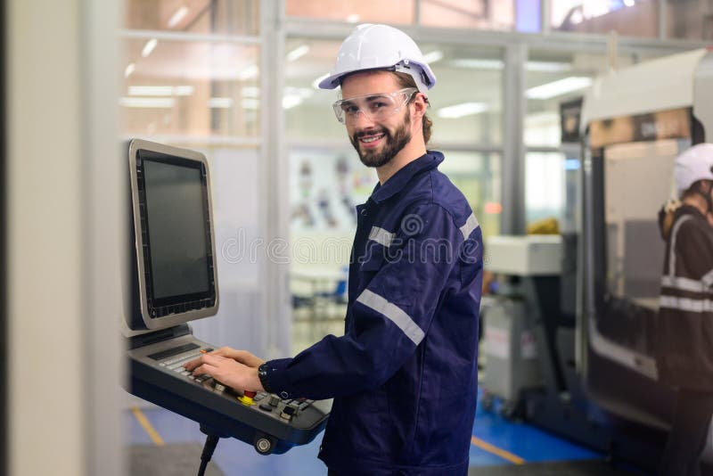 Technician with White Helmet Checking and Repairing Part Stock Photo ...