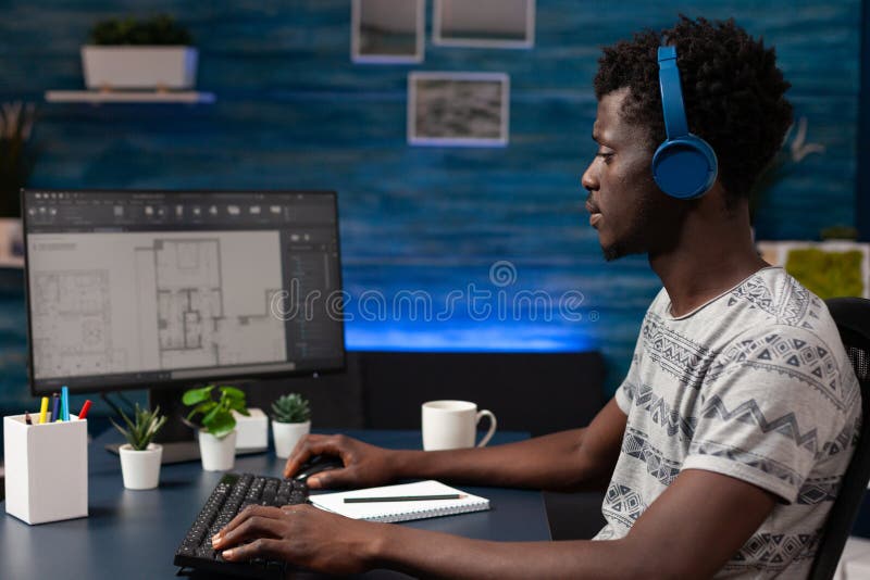 Professional Technician Designer Sitting at Desk Analyzing Building ...