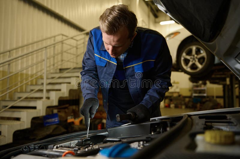 Professional Technician, Mechanic Checking Car Engine. Auto Mechanic ...