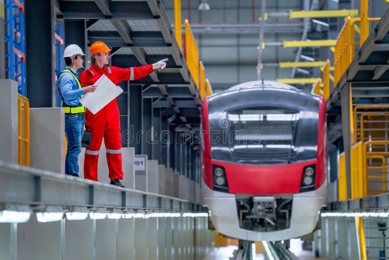 Professional Technician Point To Right Direction and Discuss with ...