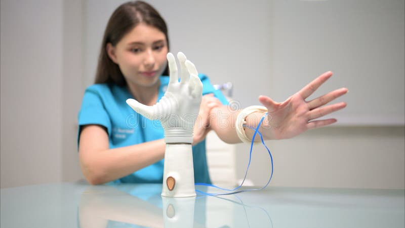 Technician Testing Robotic Bionic Arm at Prosthetic Manufacturing Stock ...