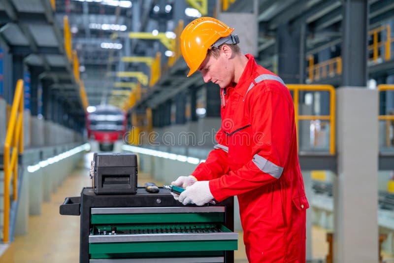 Professional Technician Worker with Safety Uniform Check Tools and ...