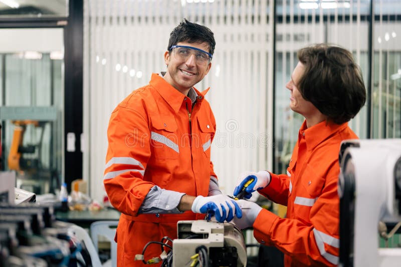 Professional Technicians Team Checking Parts of Automatic Robotic ...