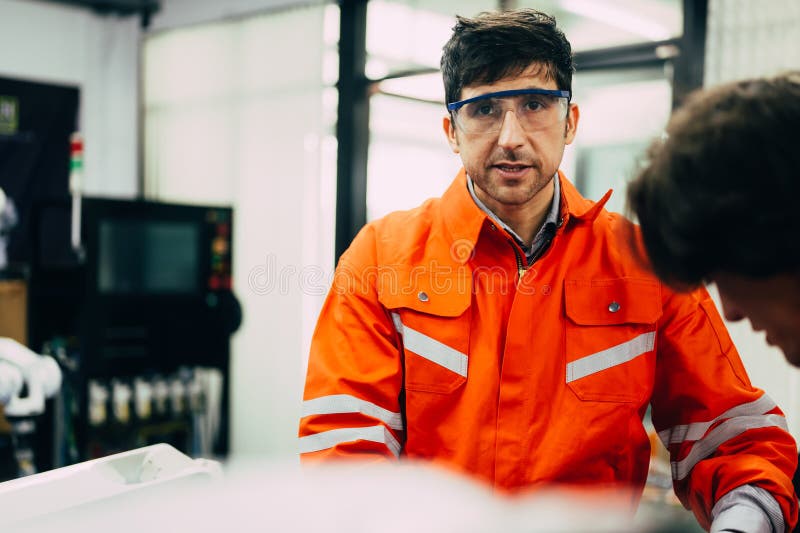 Professional Technicians Team Checking Parts of Automatic Robotic ...