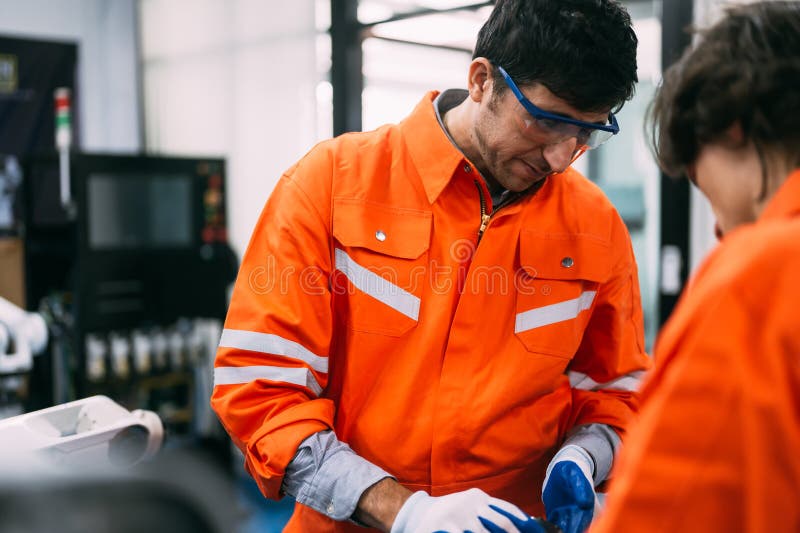 Professional Technicians Team Checking Parts of Automatic Robotic ...