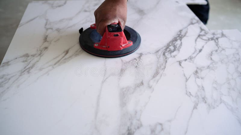 Construction Worker Placing Marble Tiles Using Suction Cup Tool Stock ...
