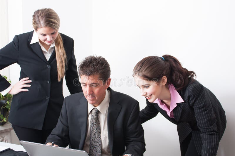 Professional Trio at work stock photo. Image of boss - 29471038