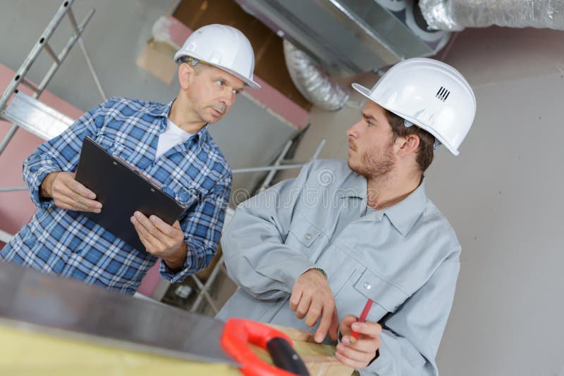 Professional Two Engineers Planning Construction Stock Image - Image of ...