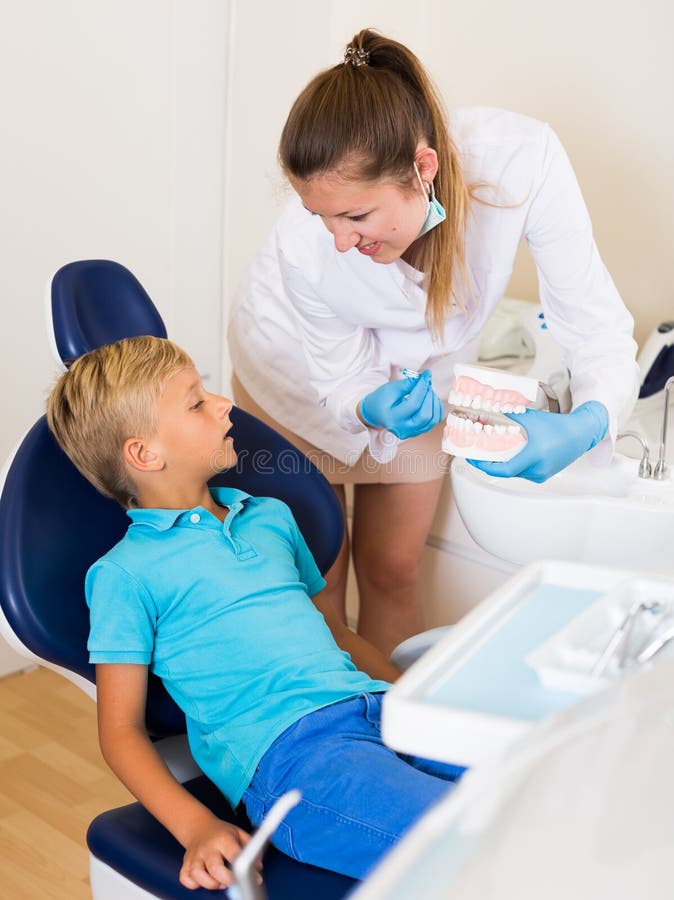 Professional in Uniform is Telling about Hygiene Stock Photo - Image of ...