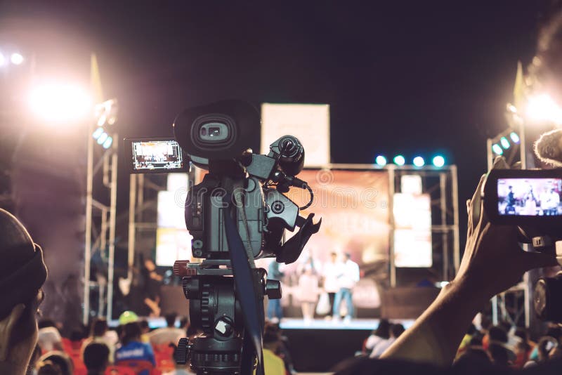 Professional Video Camera with Abstract Blurred Background Stock Image ...