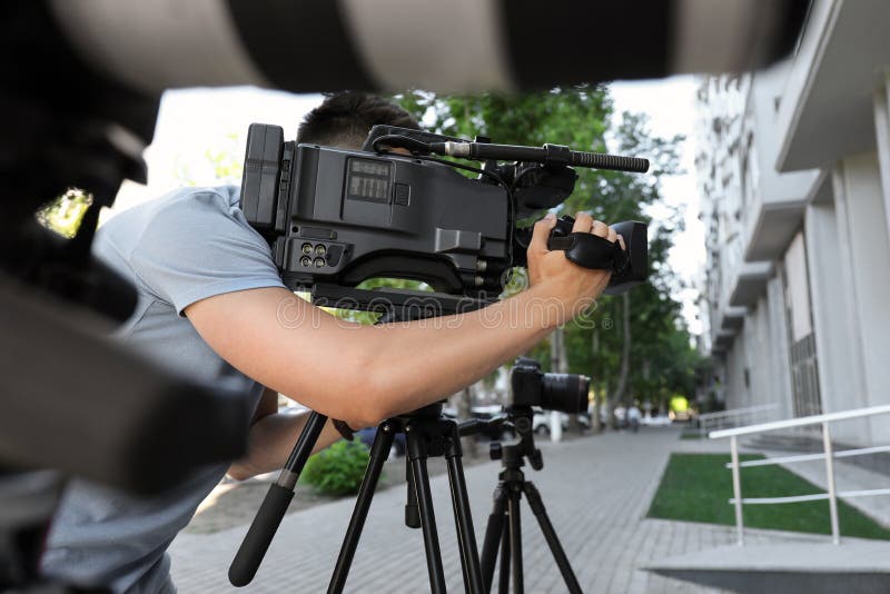 Professional Video Camera Operator Working on City Street Stock Image ...