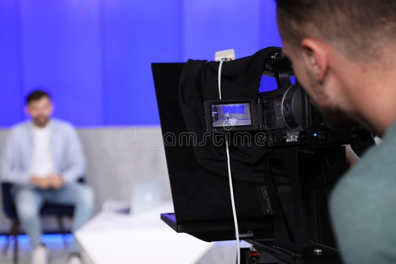Professional Video Camera Operator Working in Studio Stock Photo ...