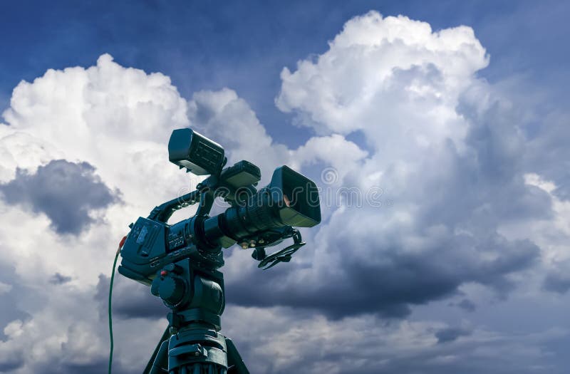 Professional Video Camera on a Tripod Stock Photo - Image of cinema ...