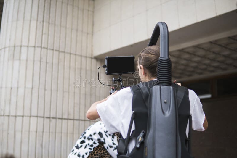 Professional Videographer Holding Camera on 3-axis Gimbal Which Mounted ...