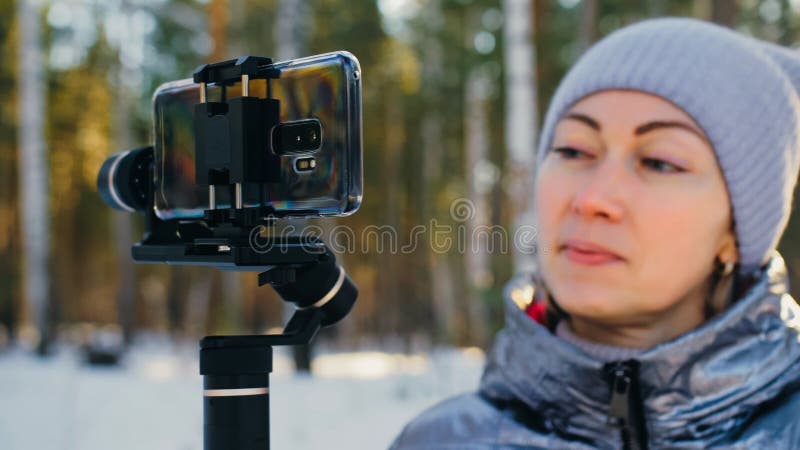 Professional Videographer Holding DSLR Camera on 3-axis Gimbal ...