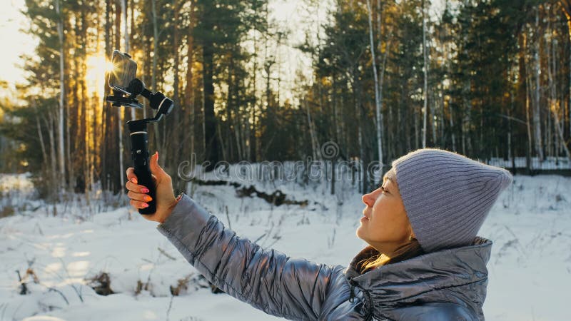 Professional Videographer Holding DSLR Camera on 3-axis Gimbal ...