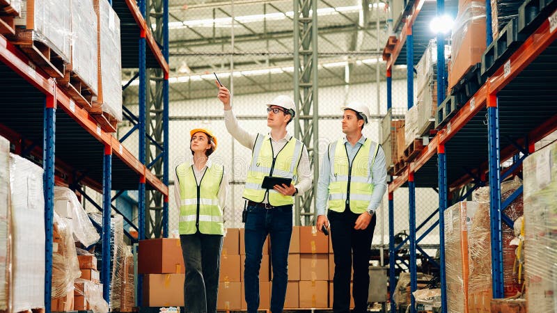 Two Warehouse Workers with Safety Helmet Working at Factory Stock Image ...
