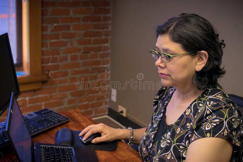 Professional Woman Busy at Work Using Computer Stock Photo - Image of ...