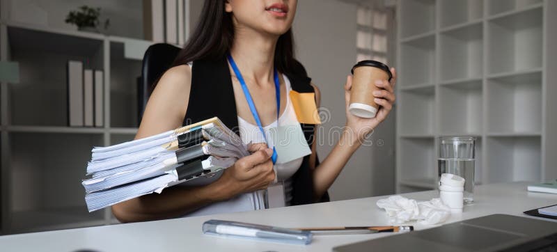 Focused Businesswoman Multitasking at Office Desk with Documents and ...