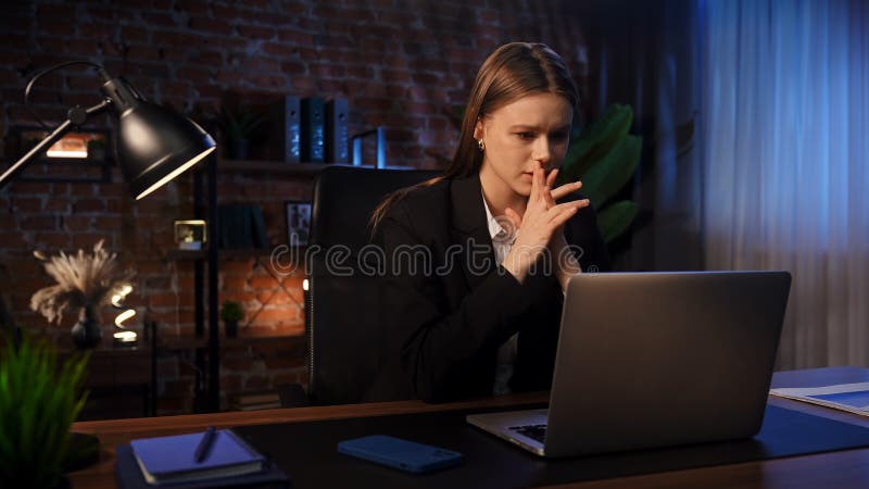 Focused Professional Woman Working Late in Modern Office Environment ...