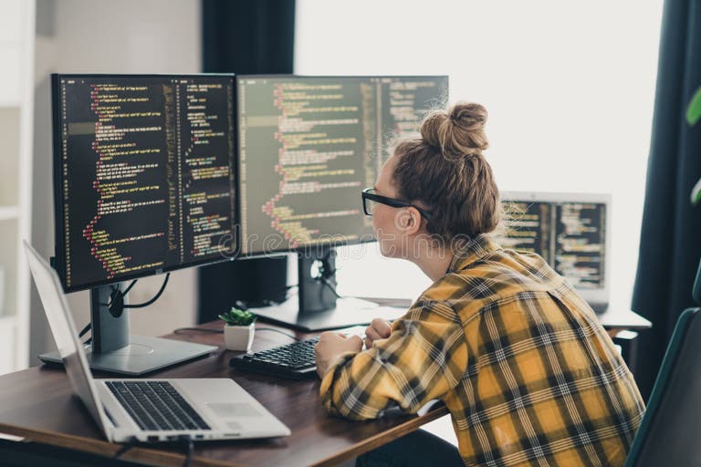 Professional Woman Programming in a Modern Home Office Workspace ...