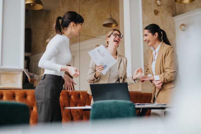 Group of Women Collaborating Joyfully in a Business Setting Stock Image ...