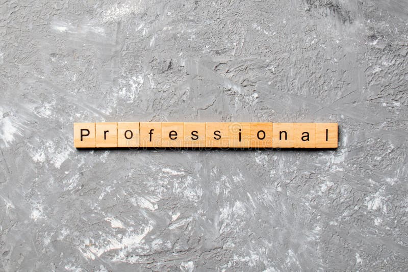 Professional Word Written on Wood Block. Professional Text on Wooden ...