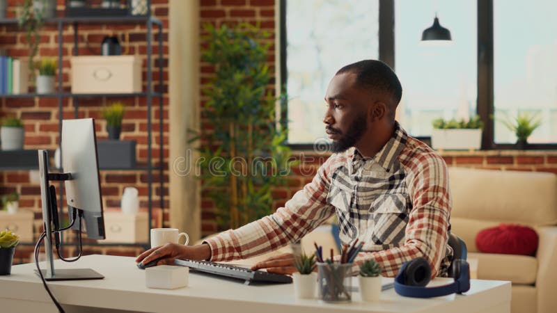 Professional Worker Analyzing Online Startup Data on Computer Stock ...