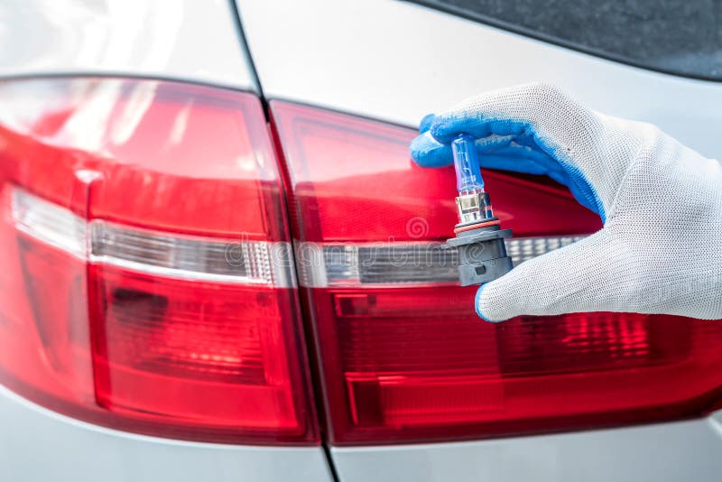 Professional Worker Changing New Halogen Light Bulbs Car Stock Photo ...