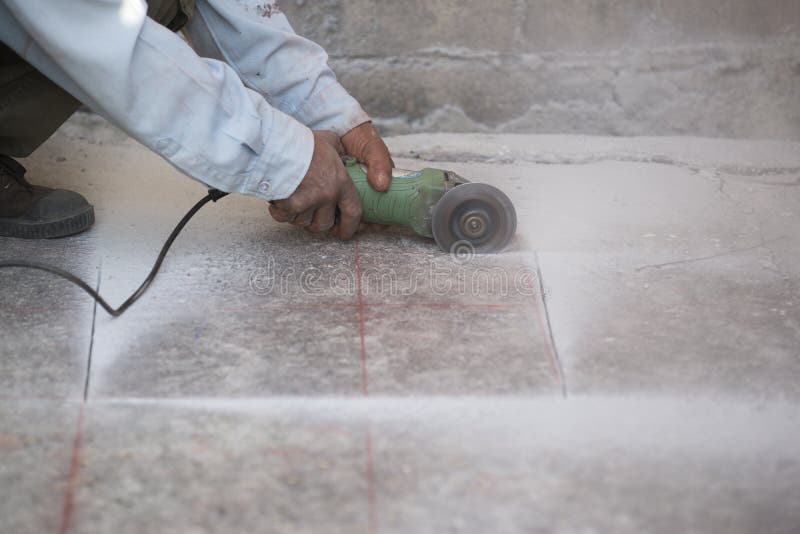 Professional Worker and Electrical Stone Cutter Construction Tools ...