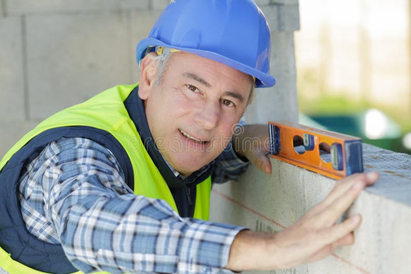 Professional Worker Holds Level Profile Stock Image - Image of profile ...