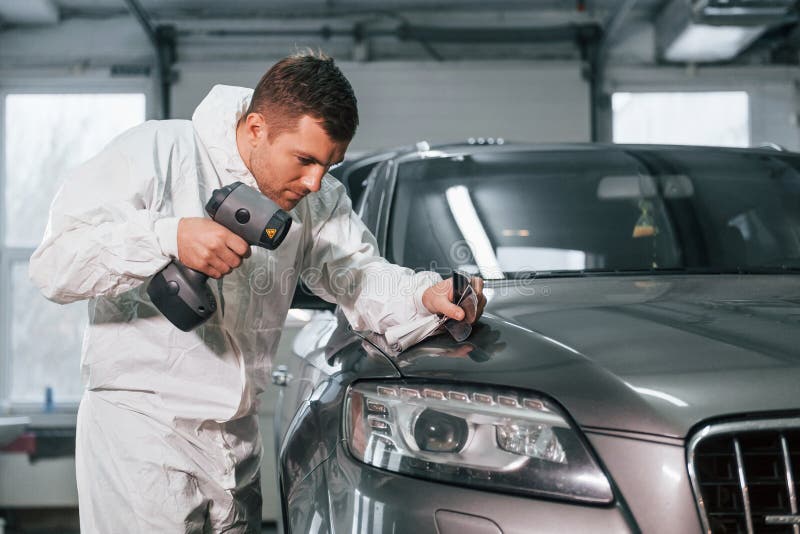 Professional Worker. Man in Uniform is in the Auto Service Stock Photo ...