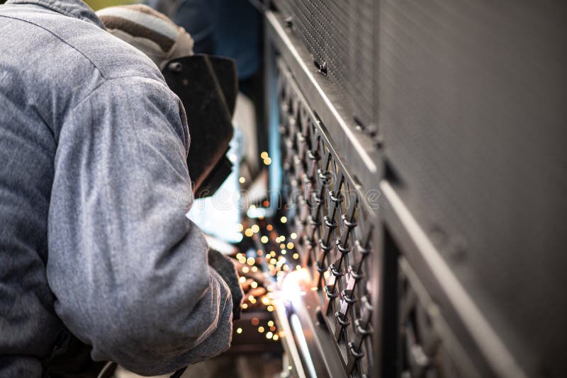 Professional Worker Performs Work on Start of Sliding Gate. Process of ...