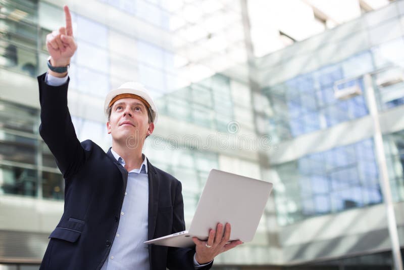 Builder Pointing To Door in Brick Wall Stock Image - Image of outdoor ...