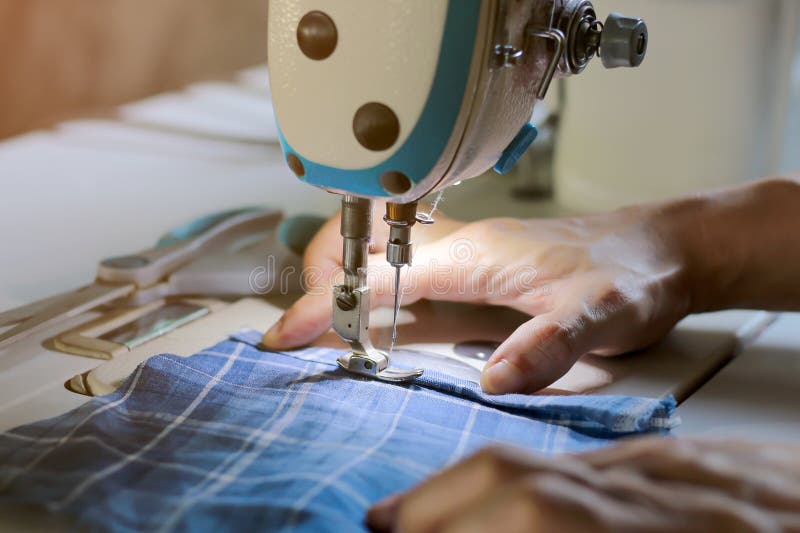 Professional Worker Sewing from Sewing Machine at Factory. Stock Image ...