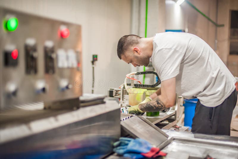 Professional Worker Technician Machinist Work in Factory Production ...