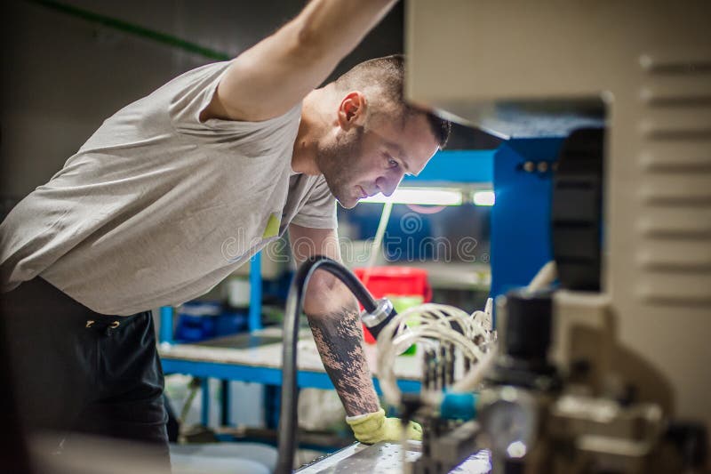 Machinist at Work stock photo. Image of factory, glow - 7303648