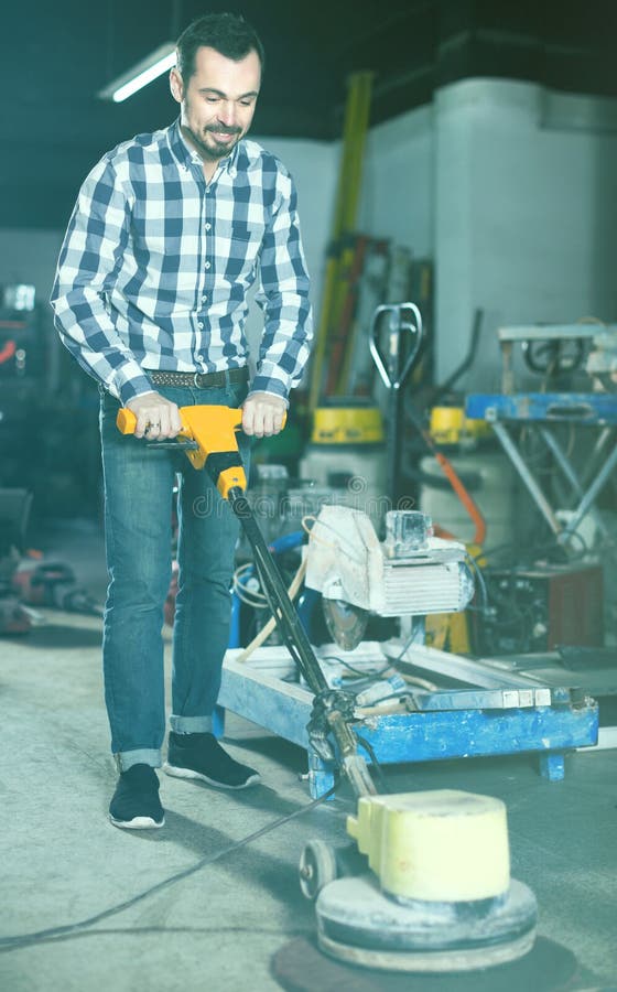 Professional Worker is Using Grinder for Construction Work Stock Image ...