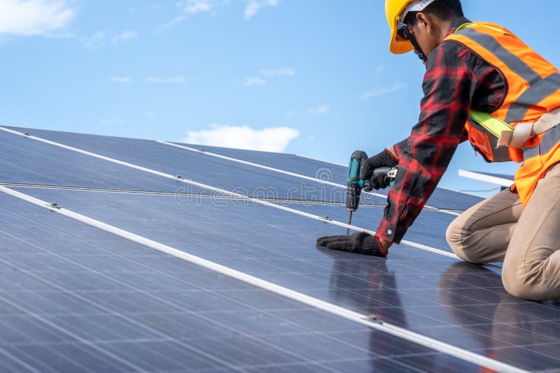 Professional Worker Working and Installing Solar Panels at Solar Power ...