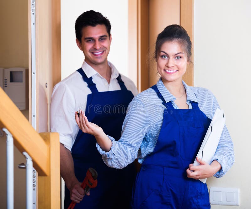 Professional Workers with Tools at Doorway Stock Image - Image of ...