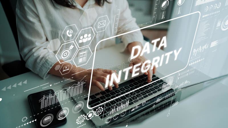 Professional Working on Laptop with Data Integrity Concept and Digital Graphics Showcasing ...