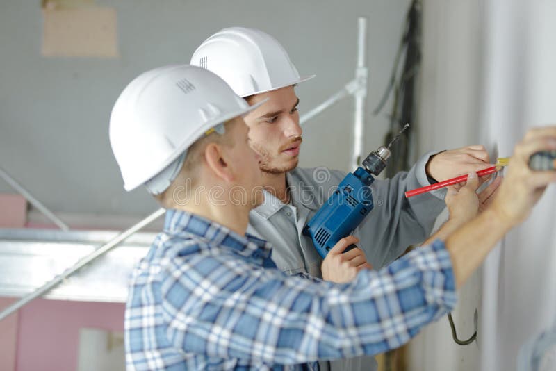 Professional Workmen Working on Wall Stock Photo - Image of decoration ...