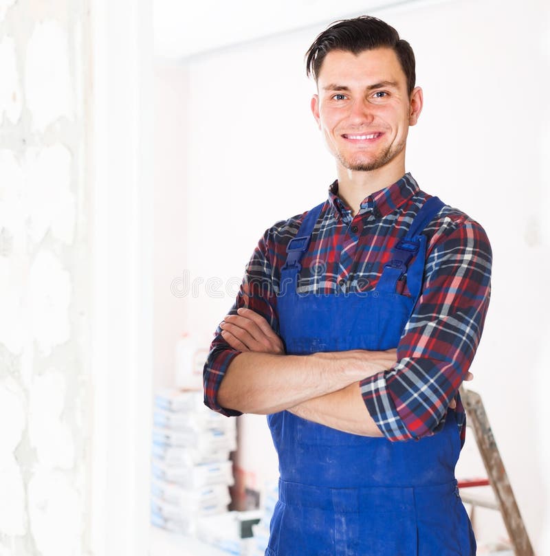 Professional Young Builder Standing in Repairable Room Stock Image ...