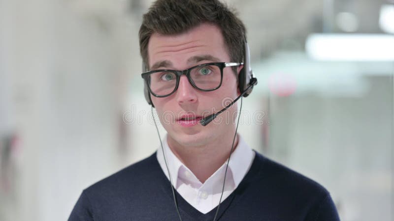 Professional Young Businessman Talking on Headset Stock Photo - Image ...