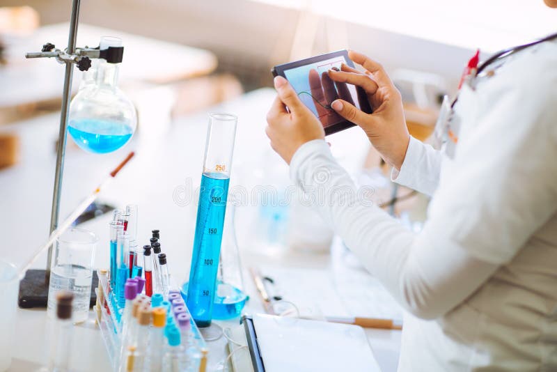 Professional Young Scientist Using Digital Tablet Stock Image - Image ... Professional Young Scientist Using Digital Tablet Stock Image - Image ...