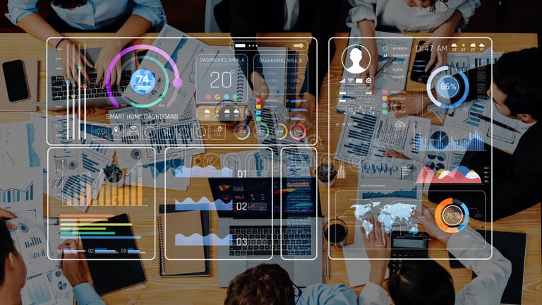 Professionals Collaborating at a Modern Office Table with Data ...