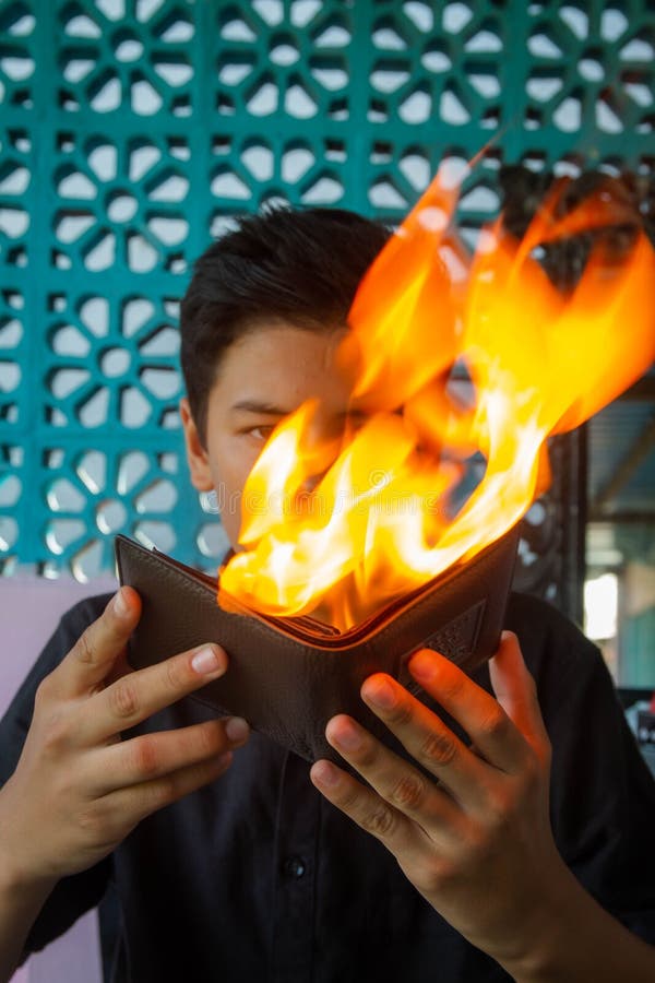 Professionals Fire Wallet - Trick by an Asian Male Stock Photo - Image of fire, auger: 258621708